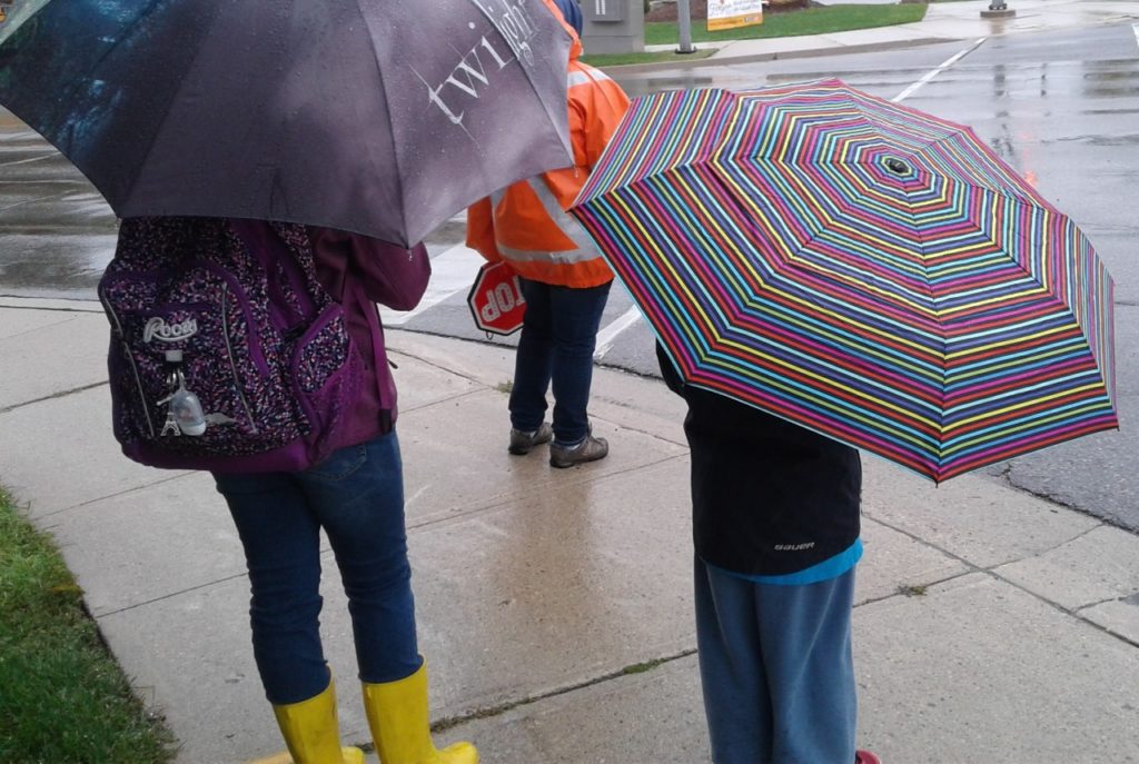 First Day Walking to School in the Rain - Wandering Wellington County